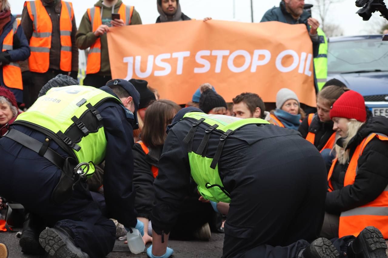 Just Stop Oil: Protestors removed by Surrey Police after climbing onto ...